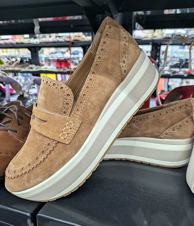 Those suede platform loafers look barely worn. Someone's shopping mistake becomes your signature style for less than the price of two lattes.