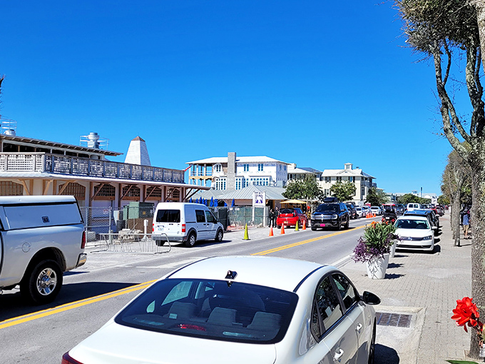 Seaside's main street feels like someone designed the ideal small town, then added palm trees and a perfect blue sky.