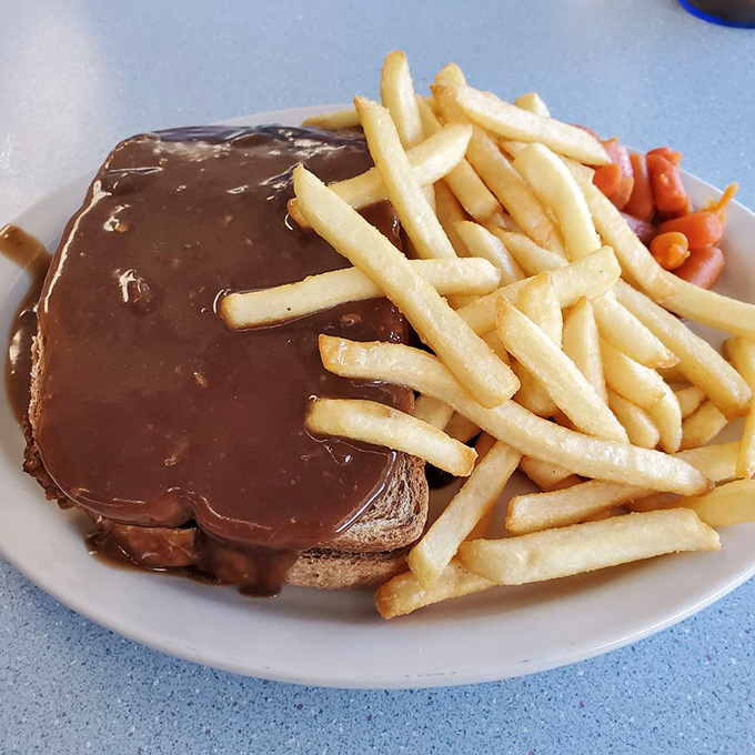 A hot open-faced sandwich smothered in gravy&mdash;comfort food that hugs you from the inside. The kind of meal that makes you want to take a nap afterward, but in the best way.