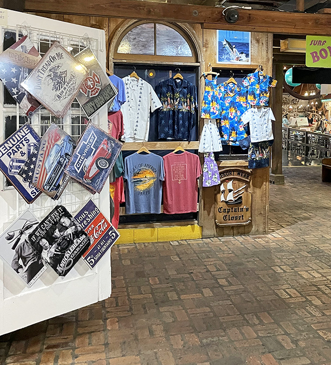 The merchandise corner says, "Yes, you'll want to remember this meal long after your sunburn fades." Tropical shirts included.