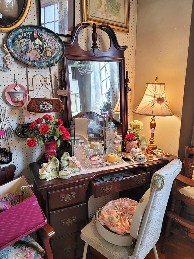 Not just a vanity&mdash;a shrine to elegance from another time. The carefully arranged perfume bottles and accessories create a tableau of vintage femininity. 