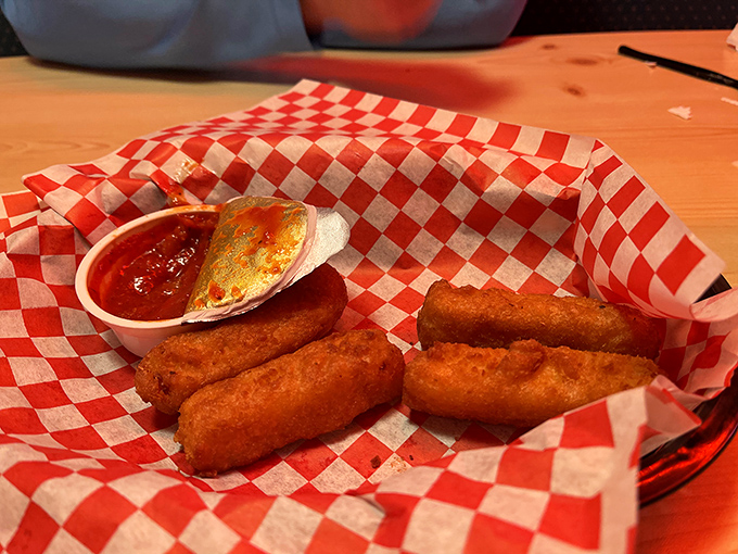 Mozzarella sticks: where the exterior crunch gives way to that perfect cheese pull. The marinara's just there to make it socially acceptable.