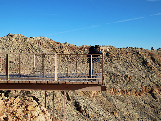 The observation deck juts out dramatically, offering that perfect Instagram moment where beauty meets potential vertigo.