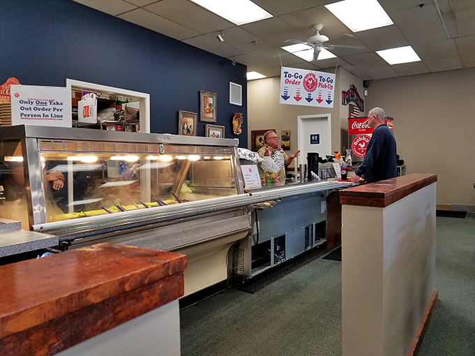 The serving line &ndash; where dreams come true and diet plans go to die, one scoop of mashed potatoes at a time.