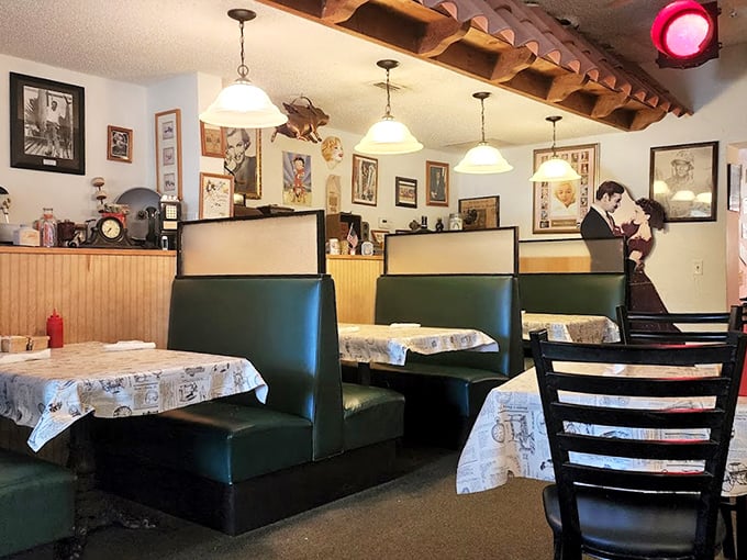 Green booth seating and vintage-inspired tablecloths create the perfect backdrop for the kind of meal that makes you forget to check your phone.