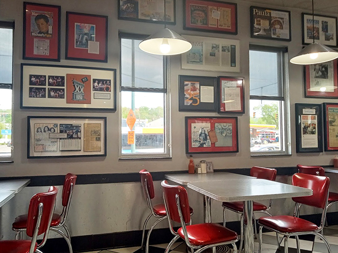 The gallery wall of fame tells stories of celebrity visits and media love letters, while diners create their own memories at chrome-trimmed tables.