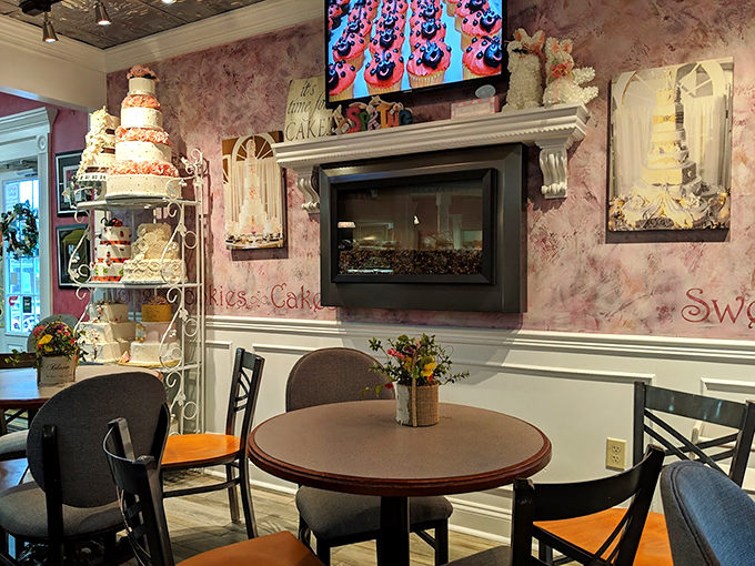The dining area whispers, "Stay awhile." Pink walls and wedding cake displays remind you that life's sweetest moments deserve proper celebration.