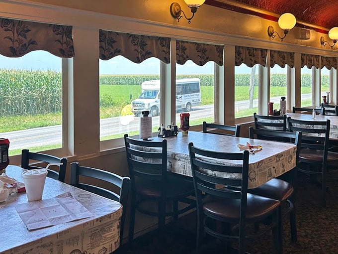 The view from these windows frames Lancaster County farmland like living paintings, turning a simple meal into dinner and a show.