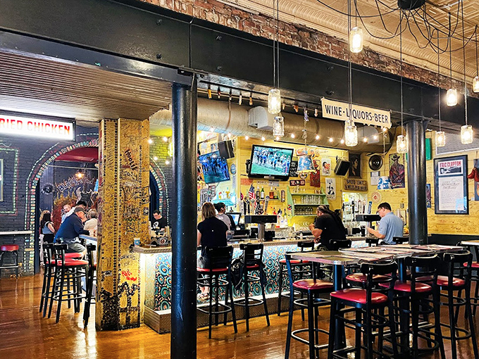 The bar area buzzes with energy and anticipation – like the backstage of a concert where the stars are bourbon bottles and craft beers.