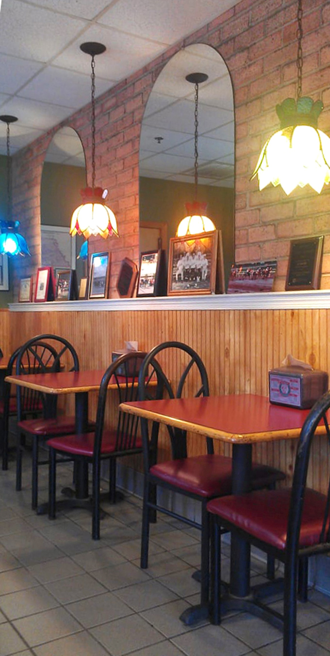 Another angle of comfort - where wooden chairs and warm lighting create instant nostalgia.