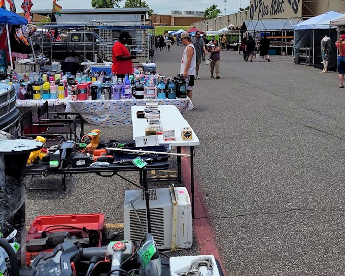 The outdoor treasure landscape, where power tools meet plastic containers under the Oklahoma sun. One person's "garage cleanout" becomes another's "just what I needed!"