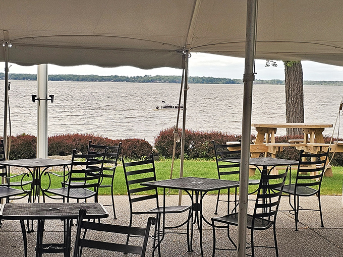 Outdoor seating where the lake view comes complimentary with every meal. Nature's television, always playing the good channel.