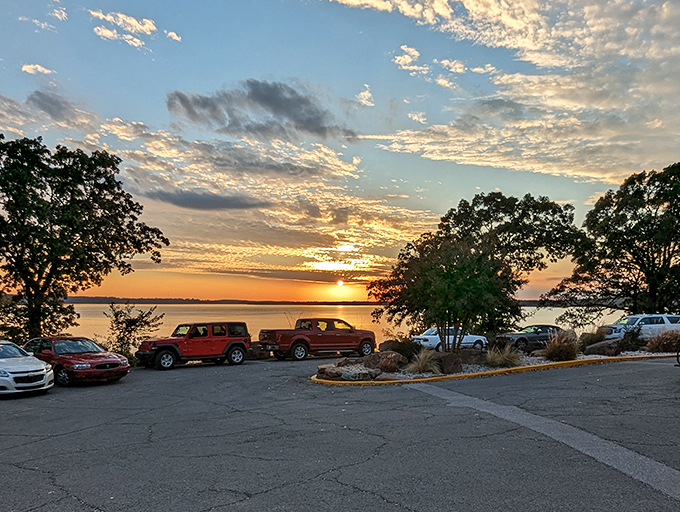 Sunset parking lot views prove that even your minivan looks majestic when Mother Nature provides the proper Instagram lighting.