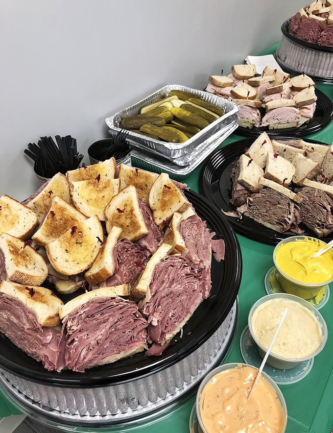 Party platters featuring mountains of sliced meats, pickles, and bread because Superior Restaurant understands celebration requires substance.
