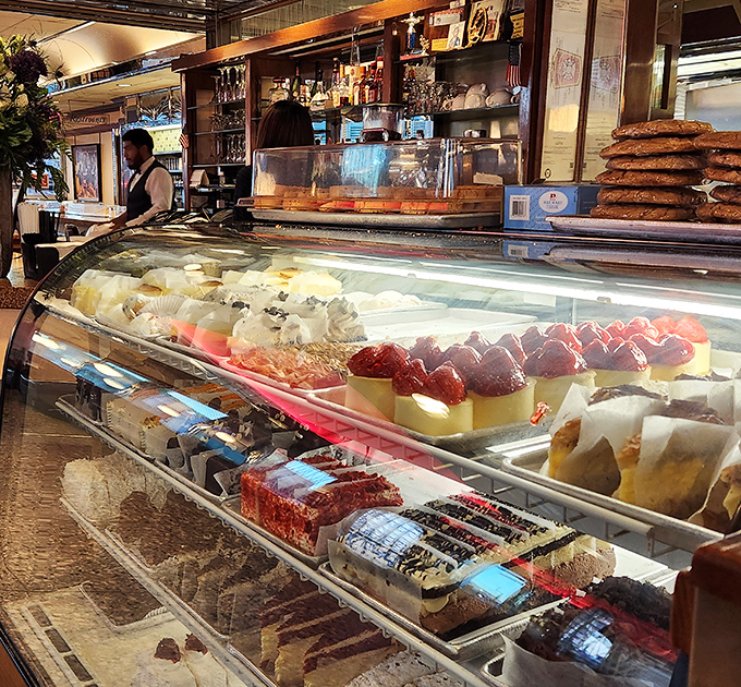 The dessert case at Metro 29 is where willpower goes to die. Each slice of cake and pie is a siren song of sweetness.