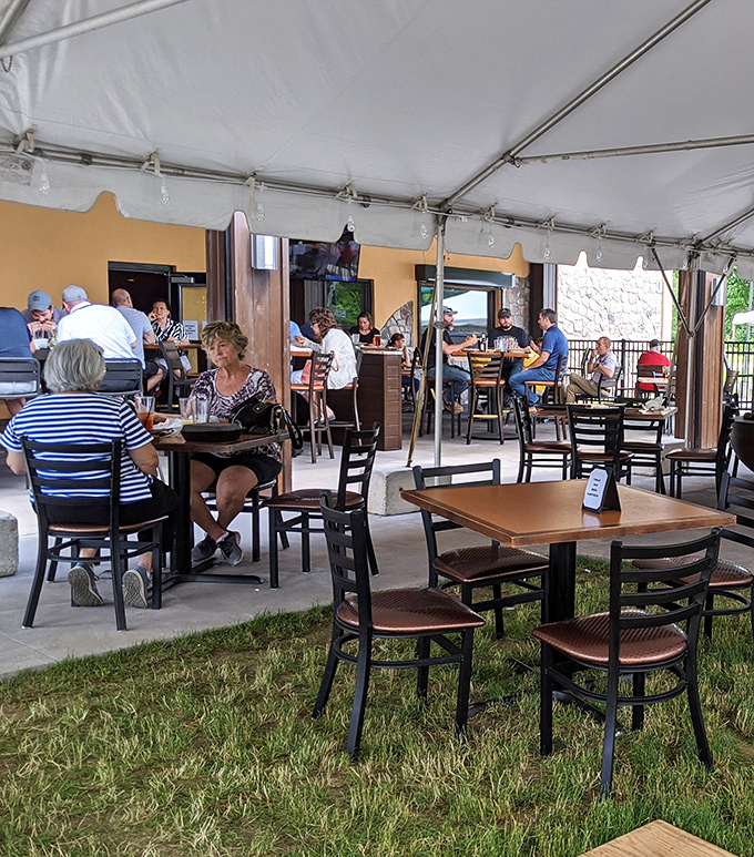 Outdoor dining that captures summer's essence. The covered patio offers weather protection while maintaining that essential "dining al fresco" feeling.