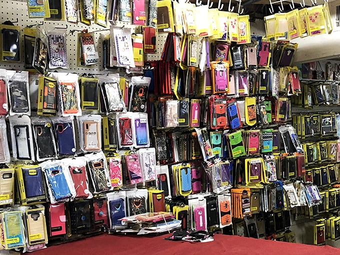 The wall of phone cases rivals any mall kiosk, offering protection for every device ever made and some that probably weren't.