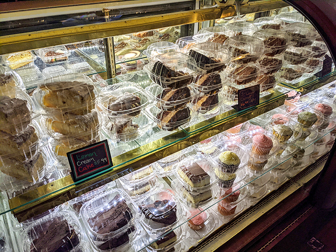 A dessert case that should come with a warning label: "May cause spontaneous happiness and the inability to choose just one."