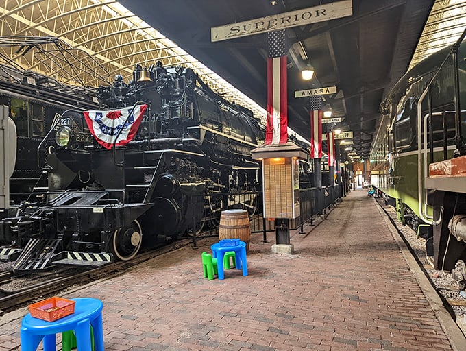 History stands still inside the Lake Superior Railroad Museum, where massive locomotives rest on brick floors beneath soaring industrial ceilings.