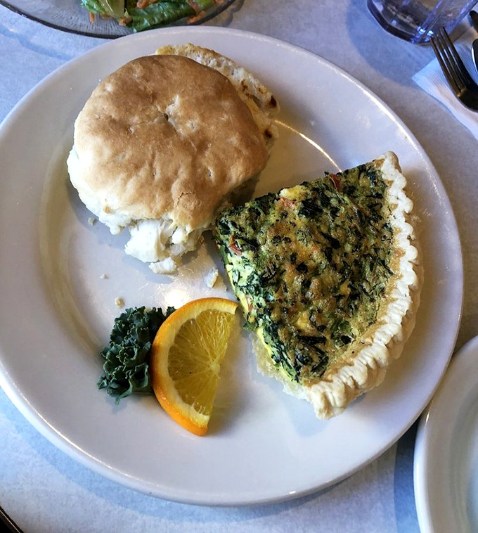 The quiche and biscuit combo&mdash;where French sophistication meets Southern charm on a plate that bridges continental divides.