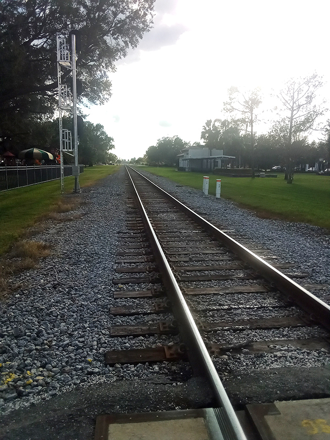 Railroad tracks remind visitors of Auburndale's history as a transportation hub. The journey to affordability sometimes requires following the right tracks.