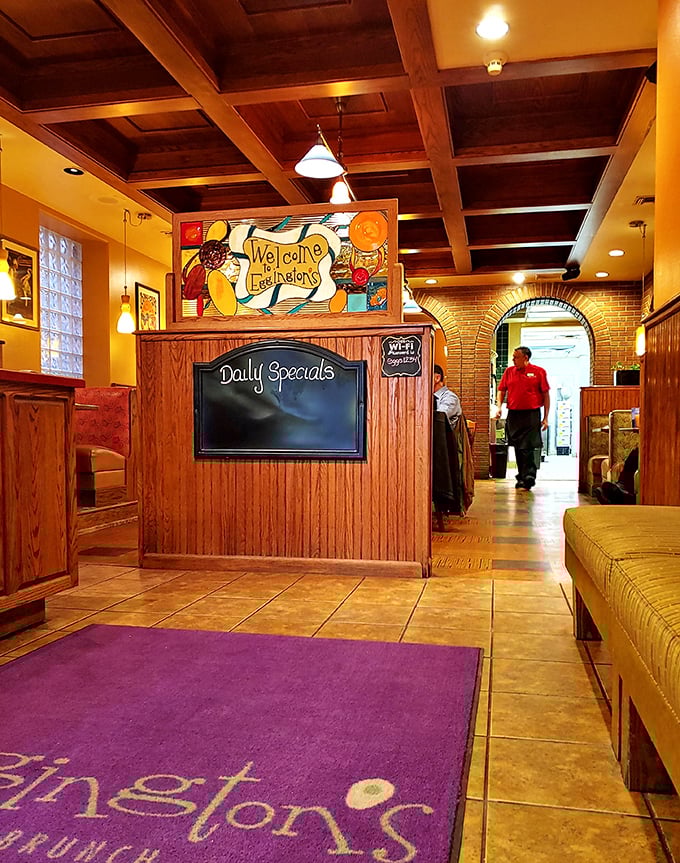 The welcoming entrance sets the tone with warm wood, colorful stained glass, and a daily specials board that changes but never disappoints.