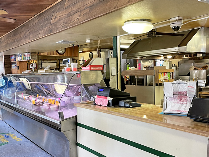 The display case - a treasure chest of oceanic delights. Those colorful price tags are like little flags marking spots on a delicious treasure map.