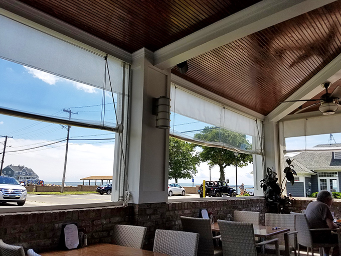 Those windows frame more than just a view—they're portals to the Connecticut shoreline that supplies the restaurant's oceanic bounty.