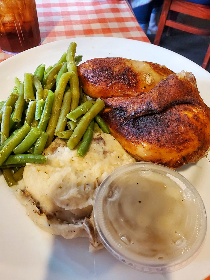 Roasted chicken proves that not everything delicious needs to be fried. The mashed potatoes and green beans provide the perfect supporting cast.