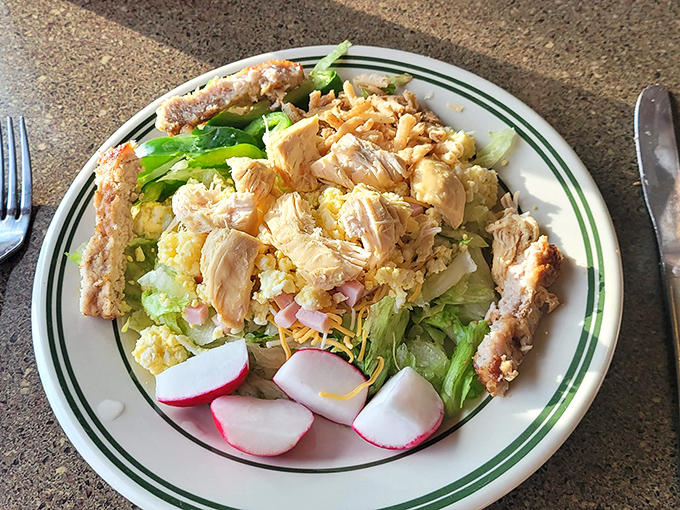 A salad that doesn't apologize for being healthy—it's too busy showing off its fresh ingredients and homemade charm.