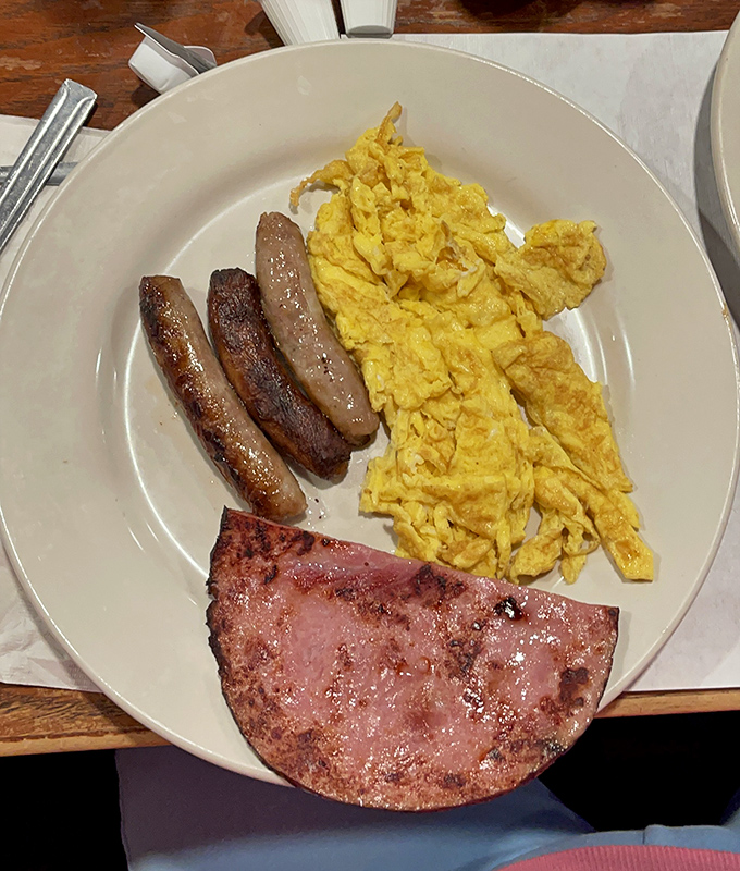 Breakfast simplicity that would make a French chef weep&mdash;perfectly cooked sausage, ham, and eggs that prove sometimes less really is more.