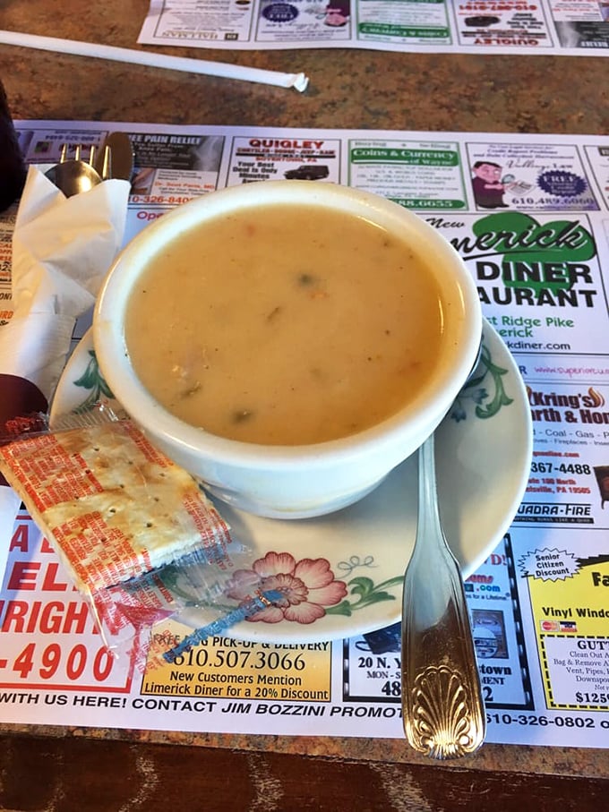 Soup that proves someone in the kitchen understands the difference between making food and making memories. Creamy, comforting, and served with crackers.