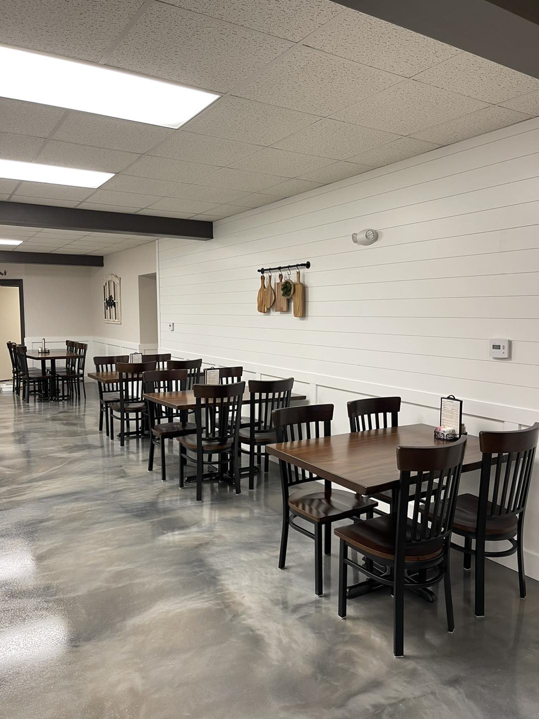 The dining room during a quiet moment&mdash;a canvas awaiting the brushstrokes of conversation, laughter, and the clinking of forks against plates.
