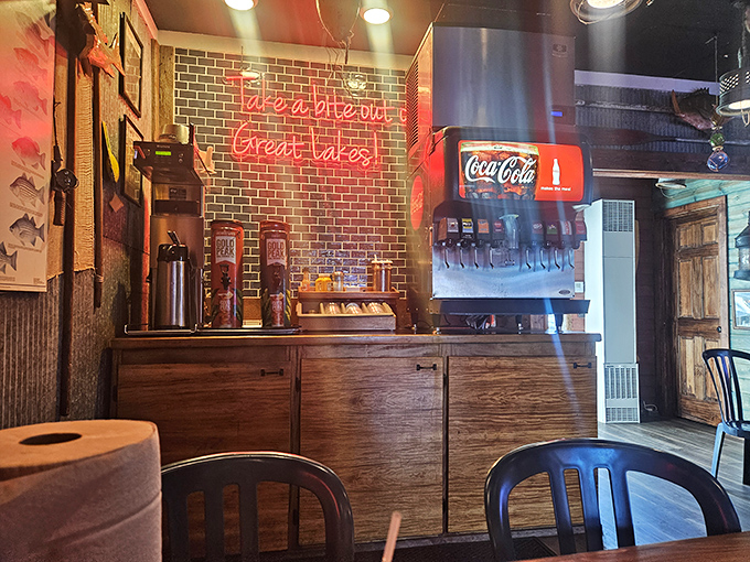 Fresh from the Great Lakes glows in neon, a promise kept with every order that passes through the kitchen window to eager hands.