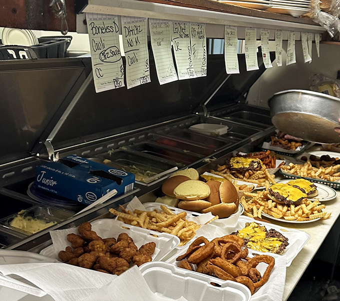 The kitchen pass&mdash;where culinary dreams come true. Those handwritten tickets are like love notes to your stomach.