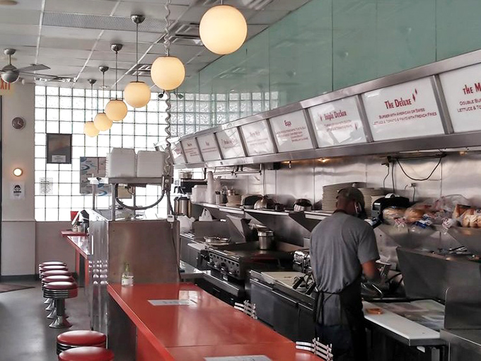 Behind the scenes but still on stage, the grill area operates with the precision of a NASA launch and the sizzle of your favorite food memories.