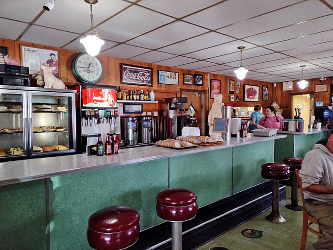 The counter where barbecue dreams come true. That pie case isn't just displaying desserts&mdash;it's showcasing edible works of art.