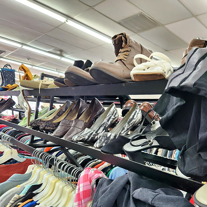 The shoe rack&mdash;a footwear island where practical boots neighbor with party heels, all patiently waiting for their Cinderella moment with the right shopper.