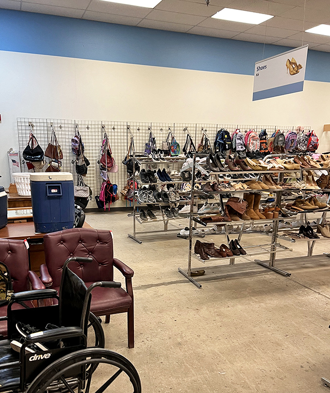 Footwear fantasyland meets handbag heaven. That burgundy chair isn't just seating—it's the perfect spot to contemplate which shoes are coming home with you.