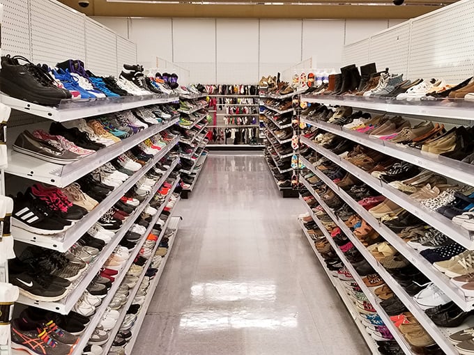 The shoe aisle: a footwear fantasyland where practical meets whimsical. Those barely-worn hiking boots next to sequined prom heels tell very different Alabama stories.