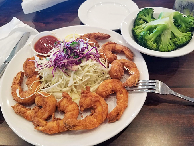 Fried shrimp arranged in a golden halo around fresh slaw&mdash;proof that sometimes the simplest preparations yield the most heavenly results.