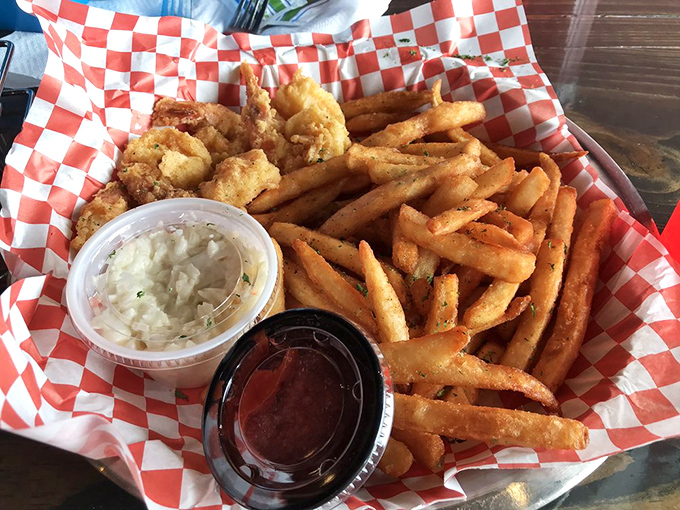 Golden-fried shrimp nestled against crispy fries&mdash;comfort food that's dressed for a night out. Two dipping sauces because life's too short for monogamous condiment relationships.