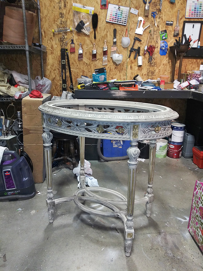 This workshop corner reveals the behind-the-scenes magic. Even Cinderella's fairy godmother needs a vacuum and some paint.