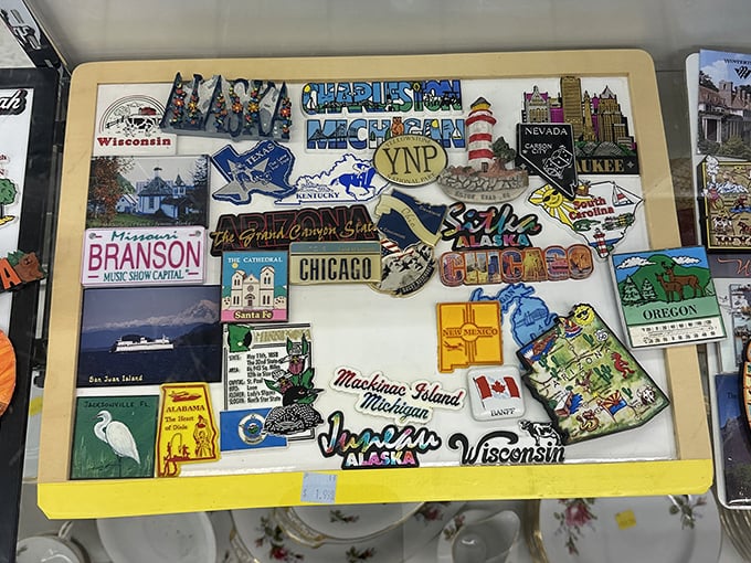 This collection of travel magnets tells stories of someone else's adventures, now available for purchase alongside your own secondhand treasures.