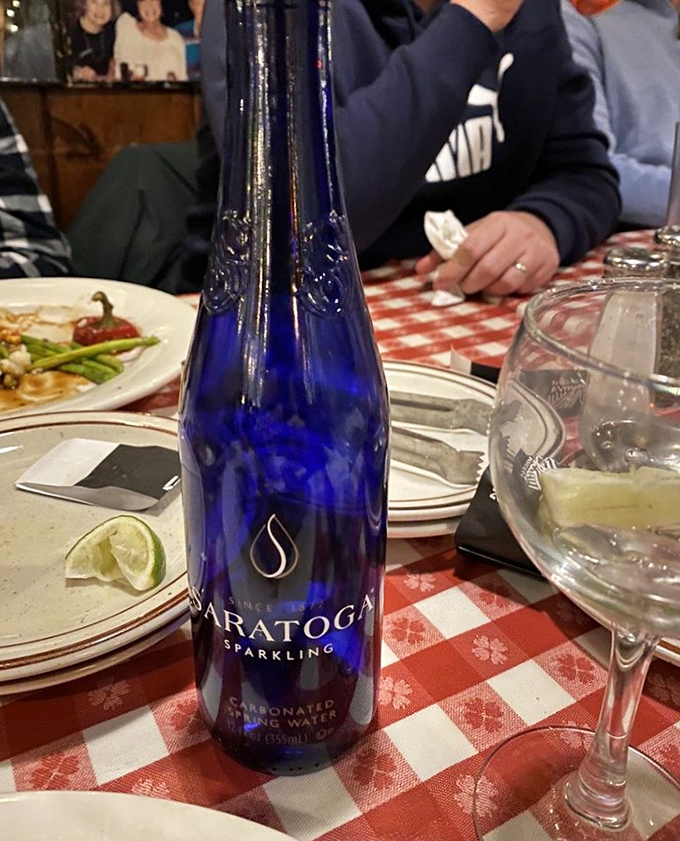 Even the water gets special treatment at Arthur's &ndash; that cobalt blue bottle adding a touch of elegance to a meal that's about to get deliciously messy.