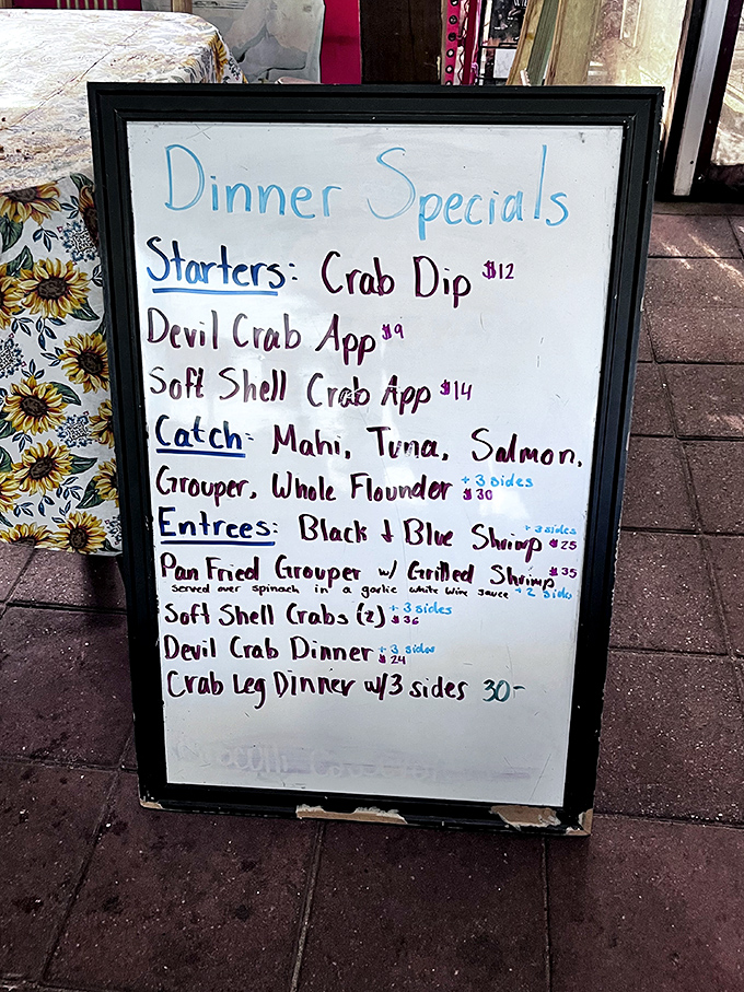 The specials board: where seafood dreams are born. When you see "soft shell crab" written in that handwriting, you know someone's having a very good day.