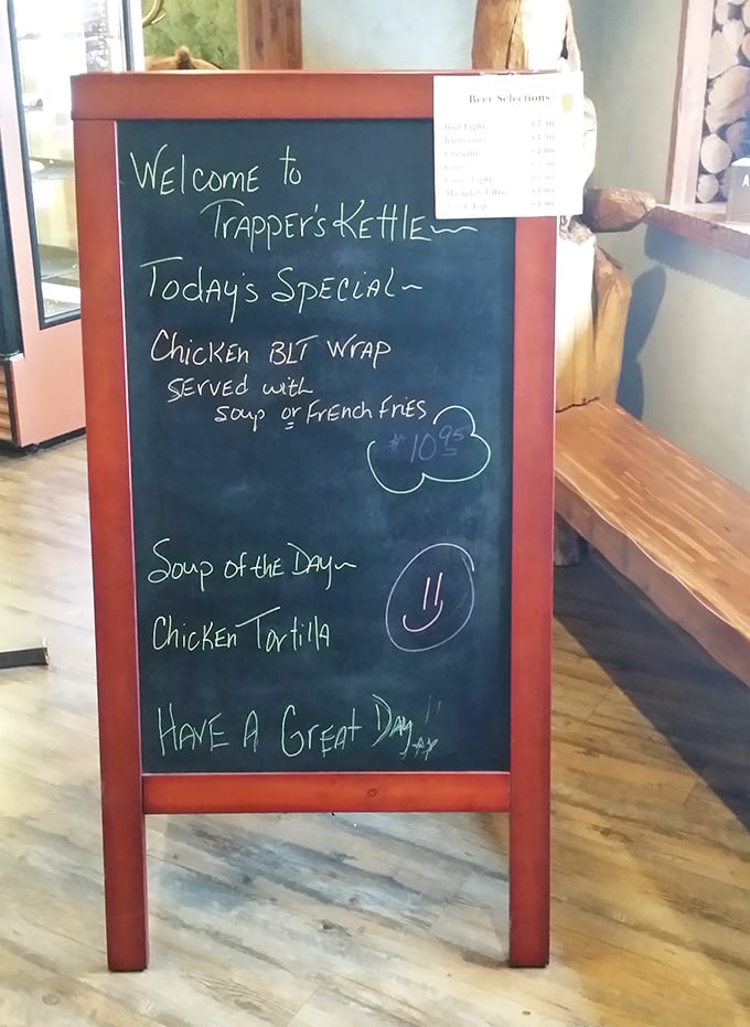 The daily specials board &ndash; where hope and hunger meet. That smiley face knows exactly what awaits your taste buds.
