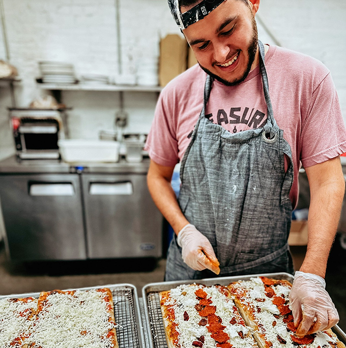 Behind every perfect pizza is someone who understands the sacred geometry of dough, sauce, and cheese. This is craftsmanship you can taste.