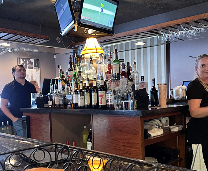 Behind every great restaurant is a dedicated staff who make the magic happen. The bar area buzzes with anticipation of the evening ahead.