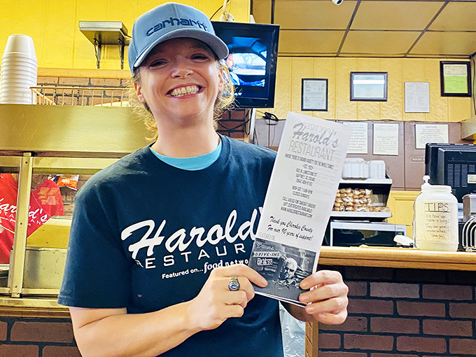 When your server smiles this genuinely while holding the menu, you know you've found a place where food is served with pride rather than pretension.